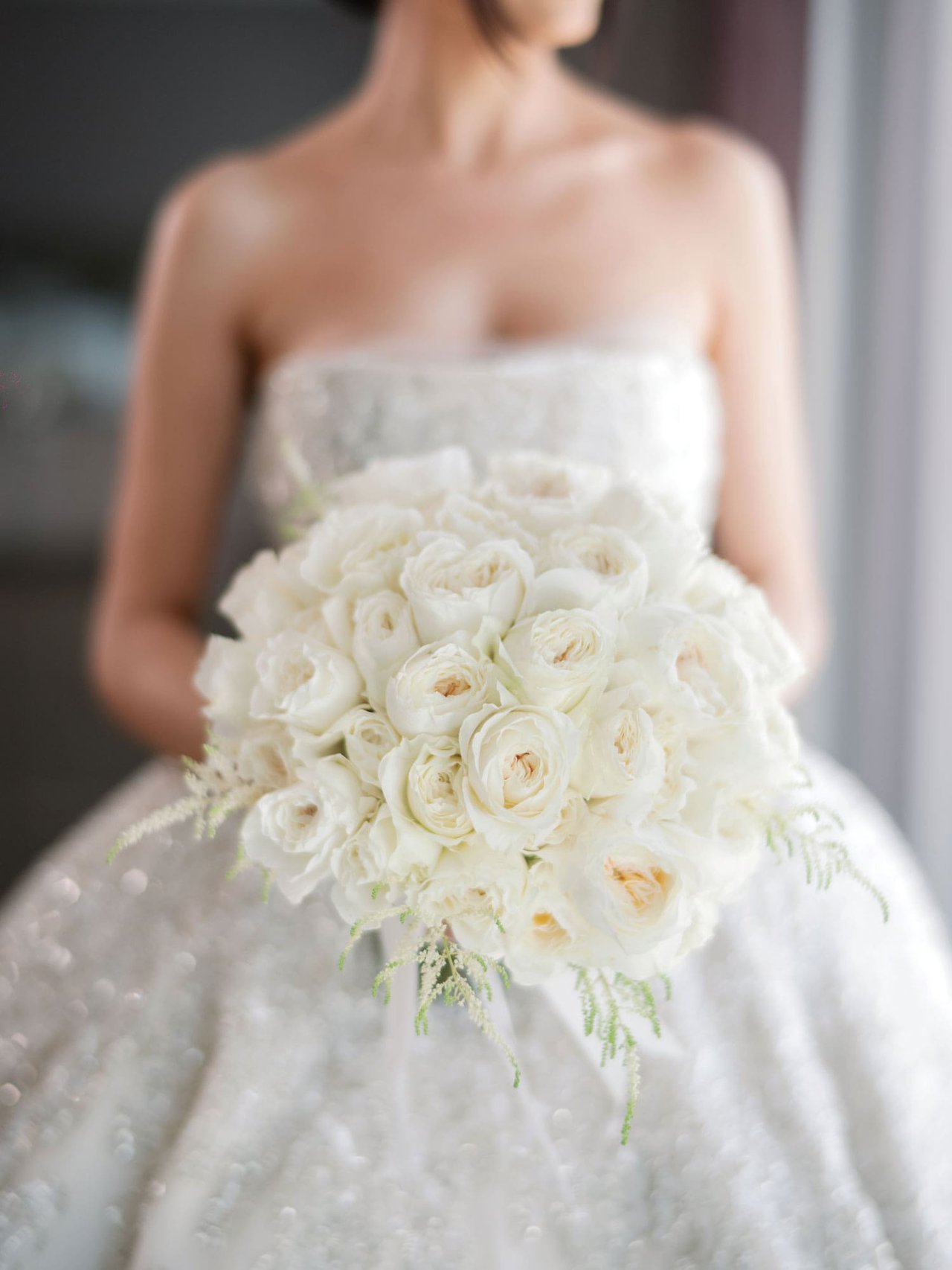 Bride in Custom Gown with White Rose Bouquet