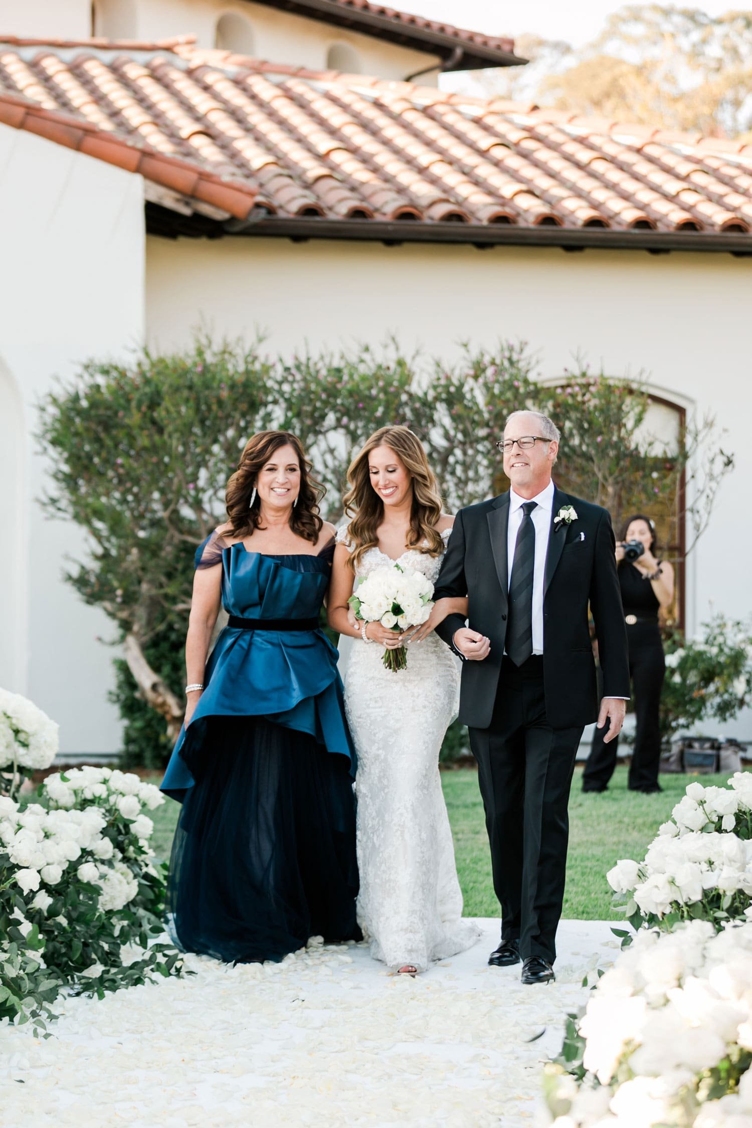 Parents Escorting Bride Down the Aisle