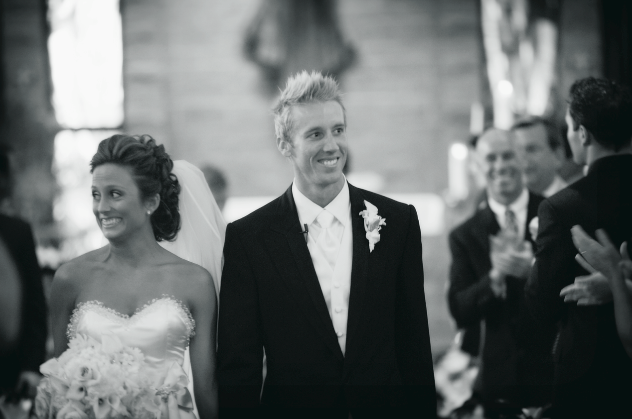 Couples Photos - Catholic Ceremony Recessional Couple - Inside Weddings