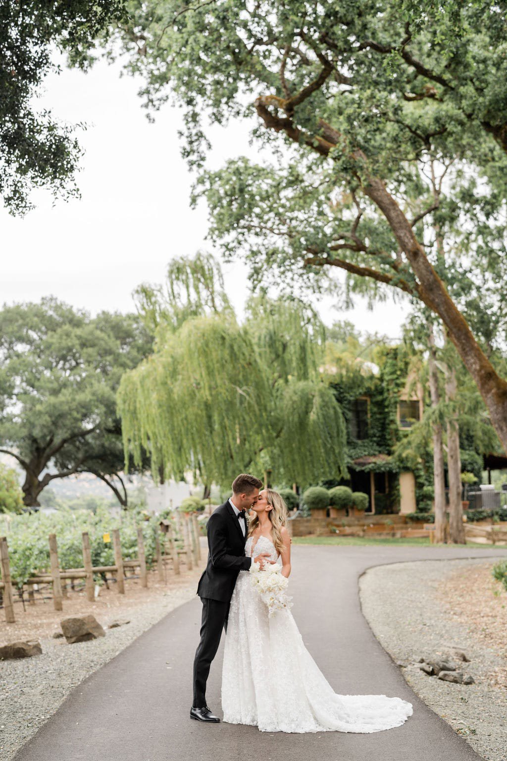 Bride & Groom Kiss at Vineyard Estate