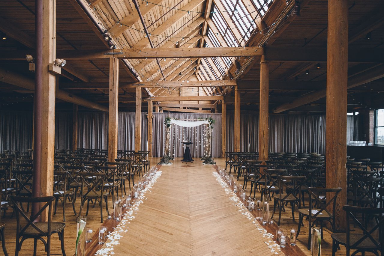 Rustic Wedding Ceremony Under Beams