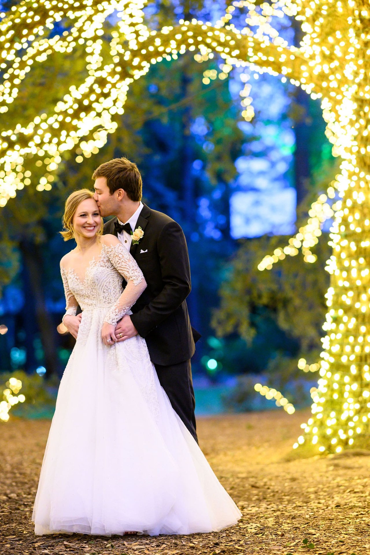 Bride & Groom Under Tree with Lights