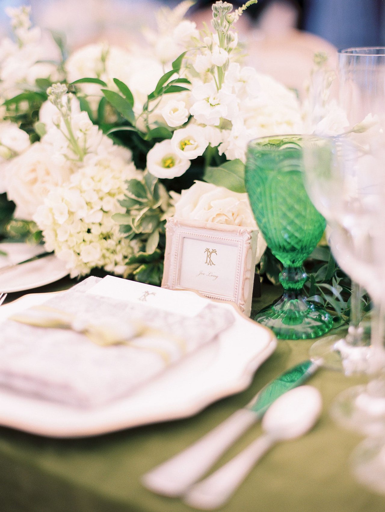 Classic Place Setting at Green Wedding Table