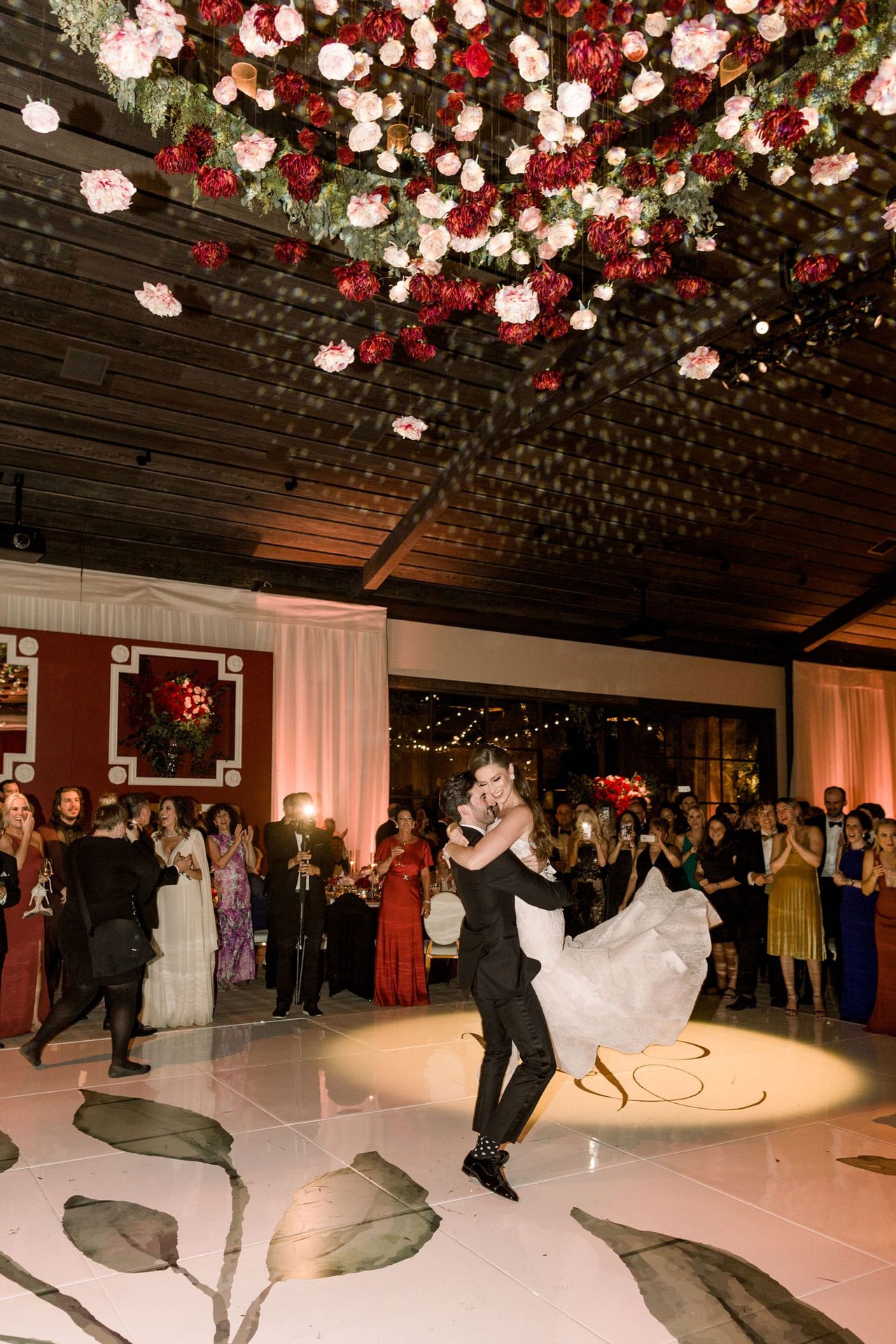 Groom Picks Up Bride During First Dance