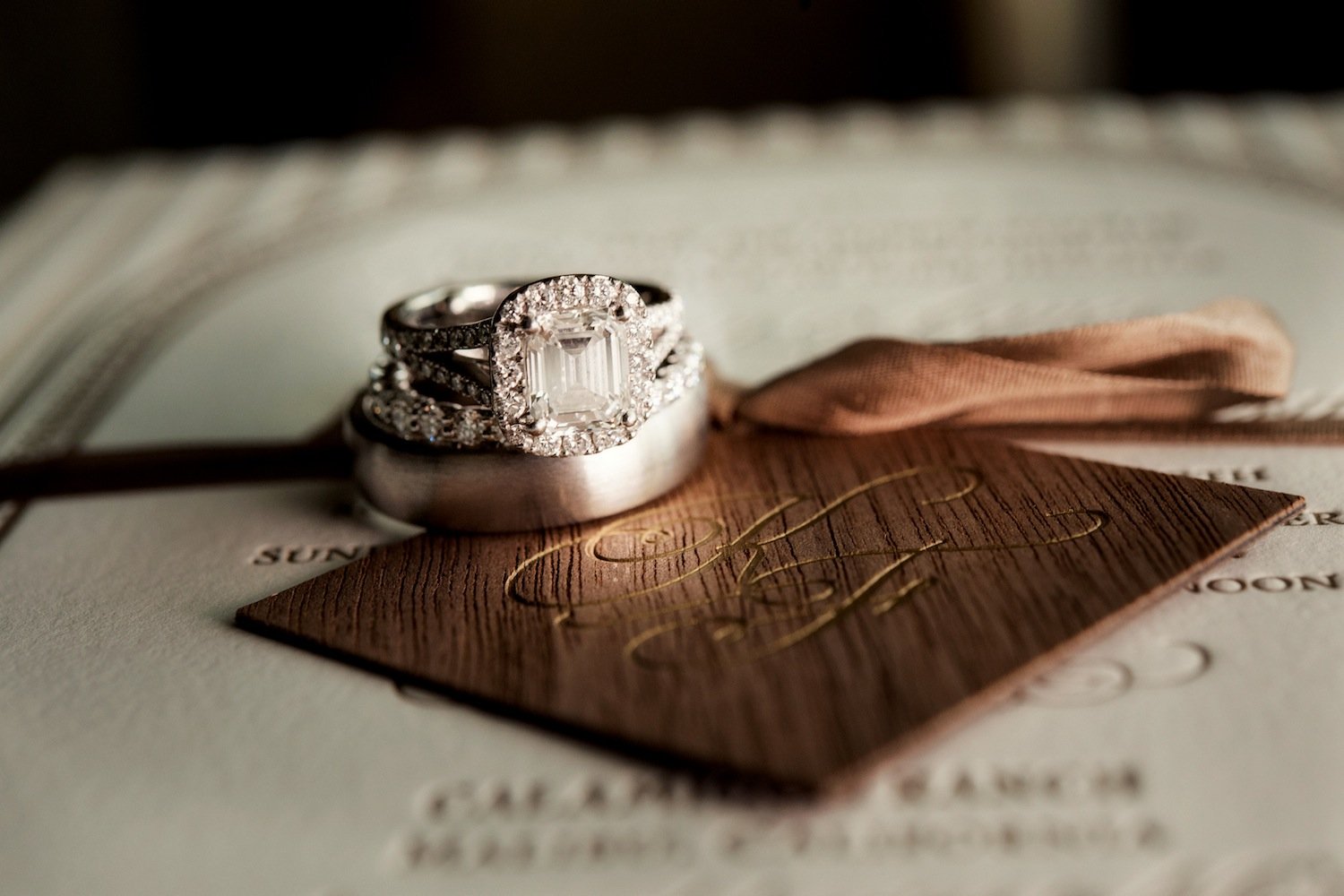 Jewelry Photos - Couple's Stacked Wedding Rings - Inside Weddings