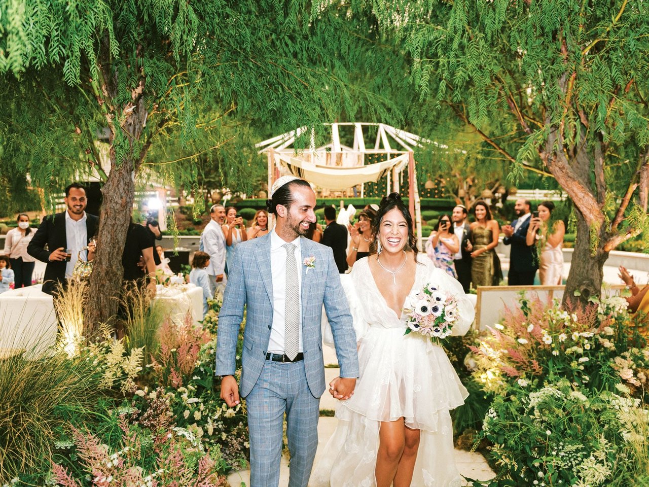 Happy Couple During Backyard Ceremony Recessional
