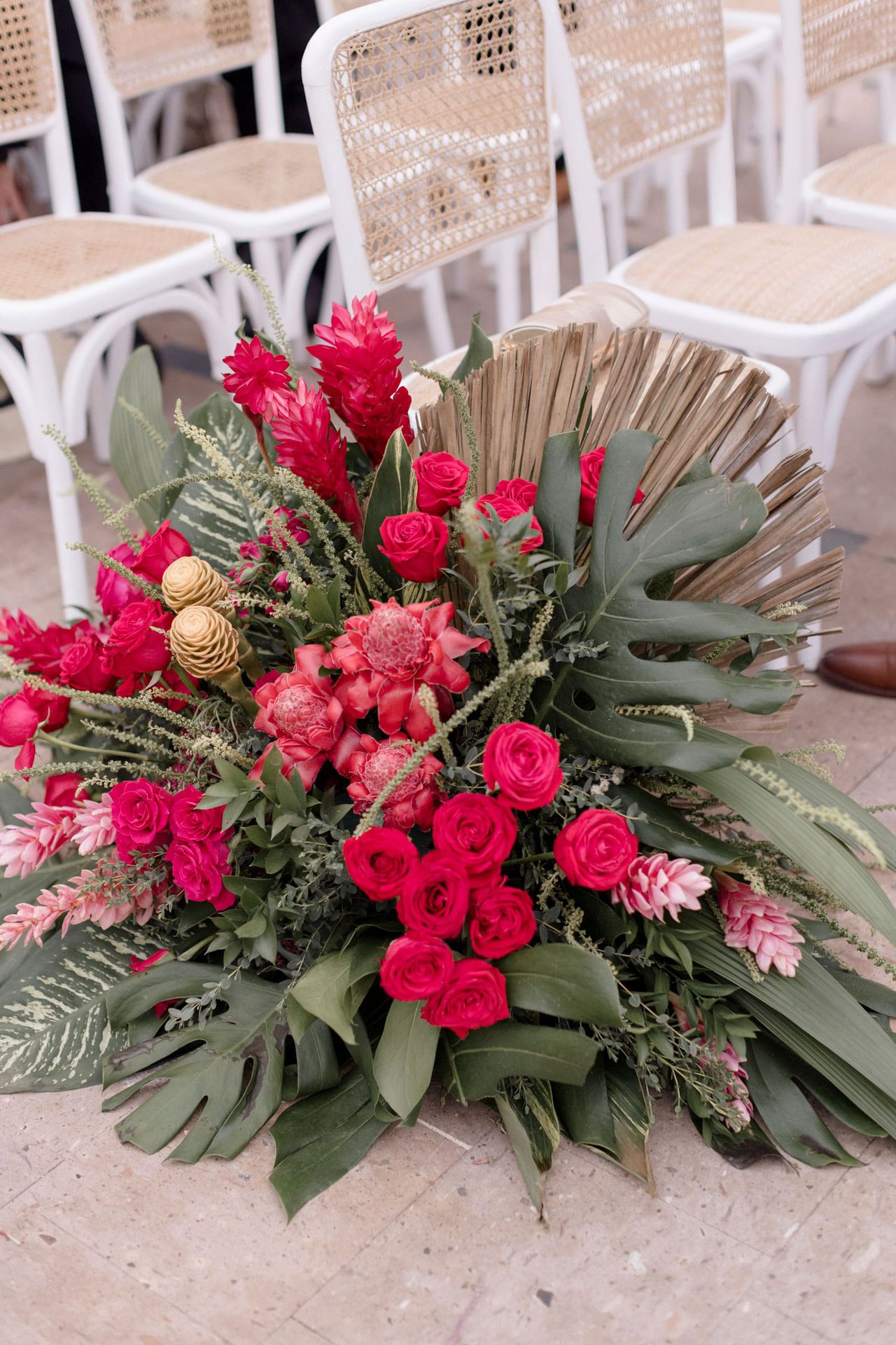 Tropical Flower Arrangement in Ceremony Aisle