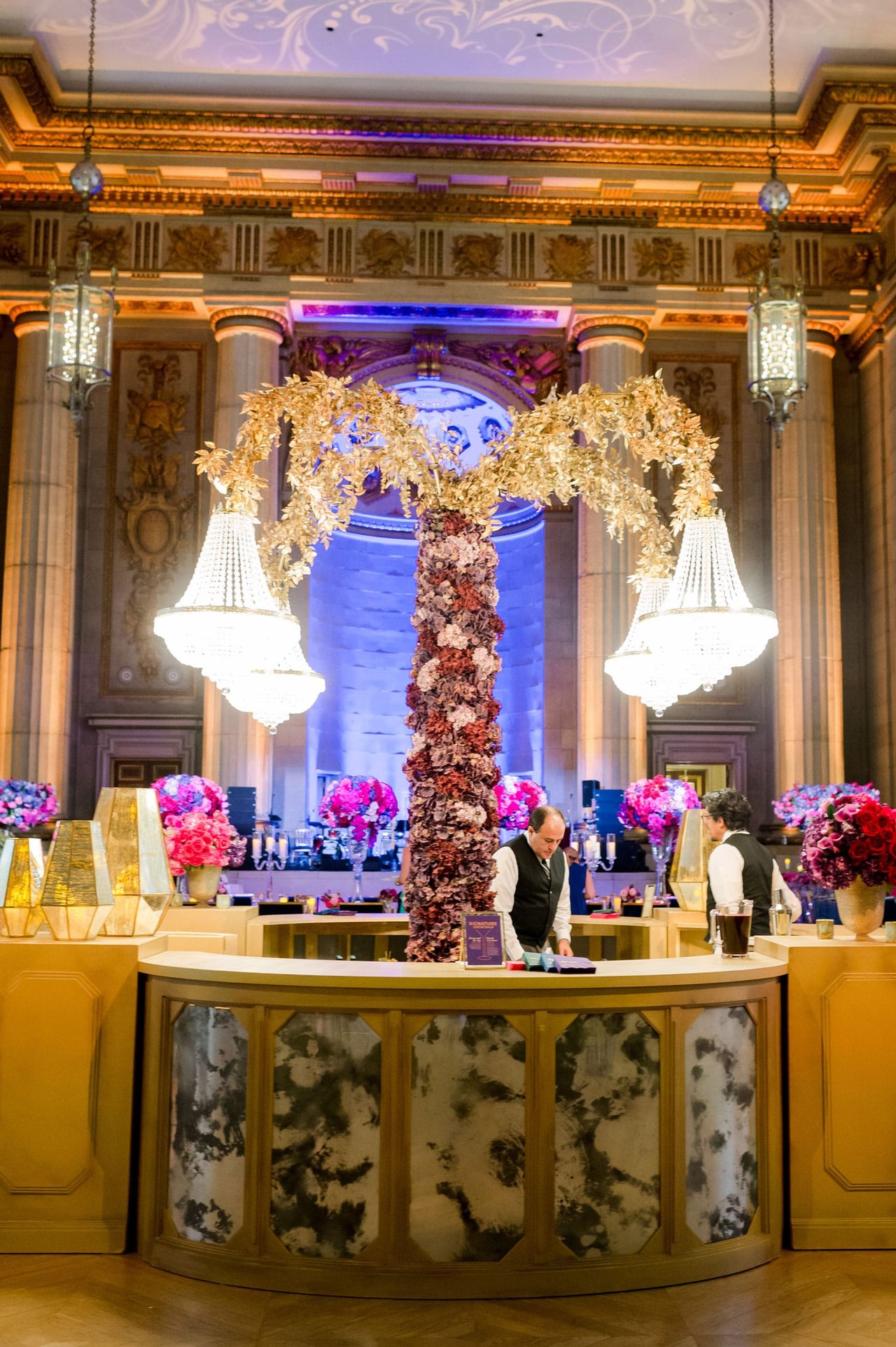 Crystal Chandeliers Over Cocktail Bar