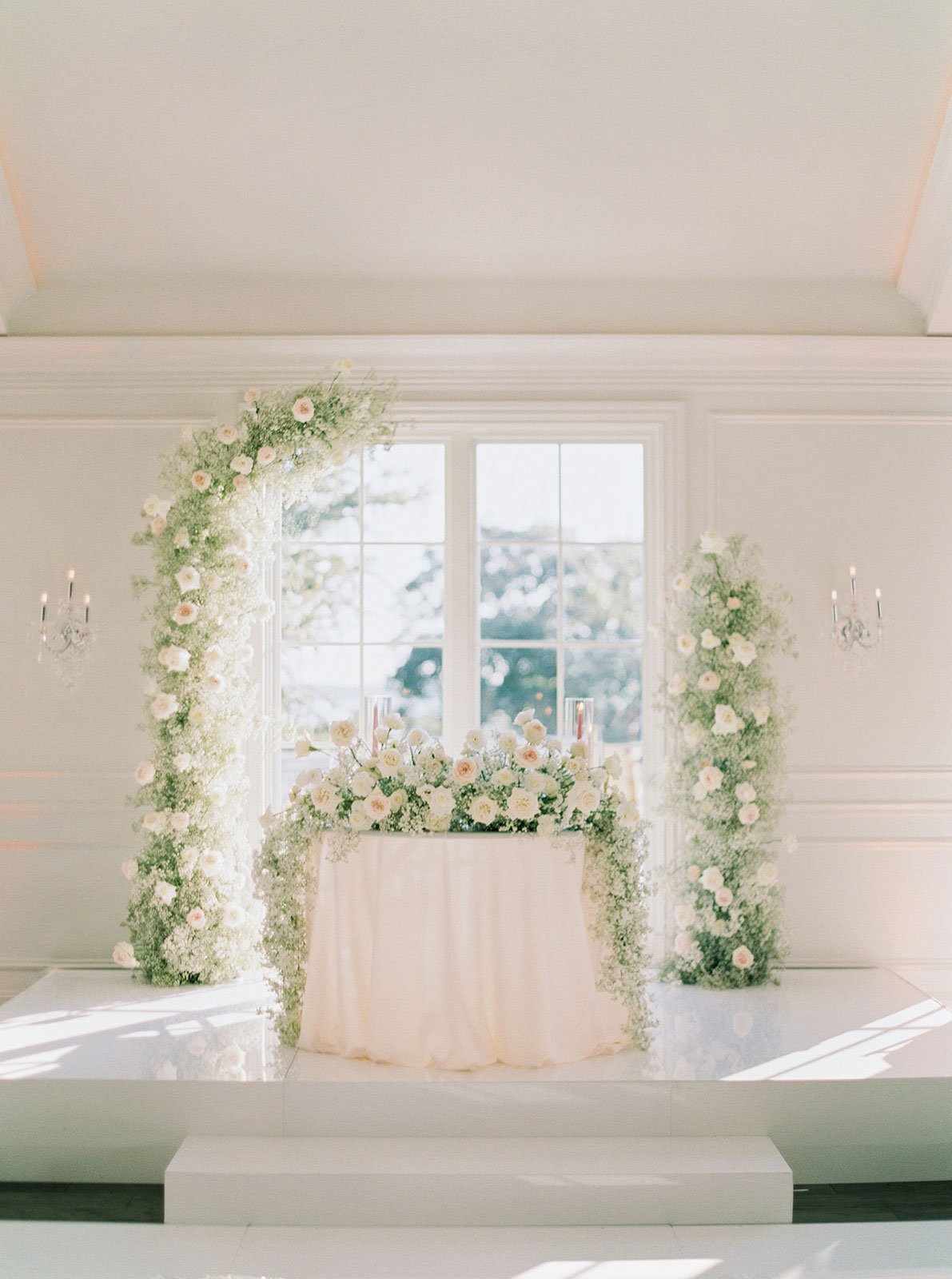 Ceremony Arch Behind Sweetheart Table