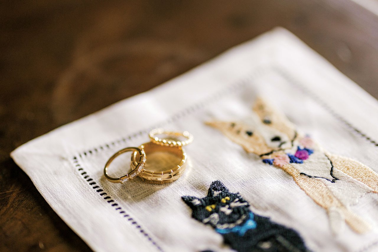 Gold Wedding Bands on Embroidered Handkerchief