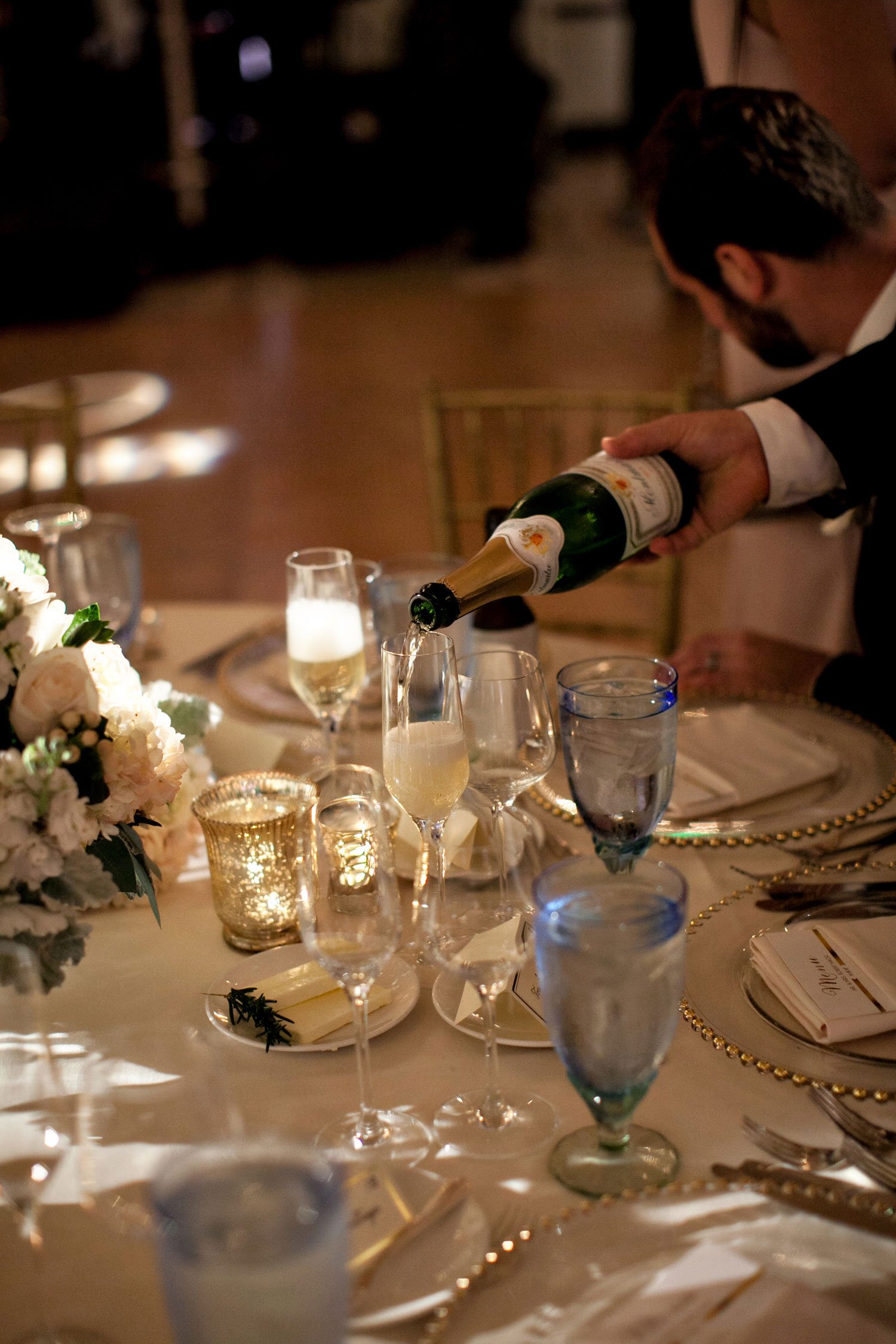 Champagne Being Poured at Reception