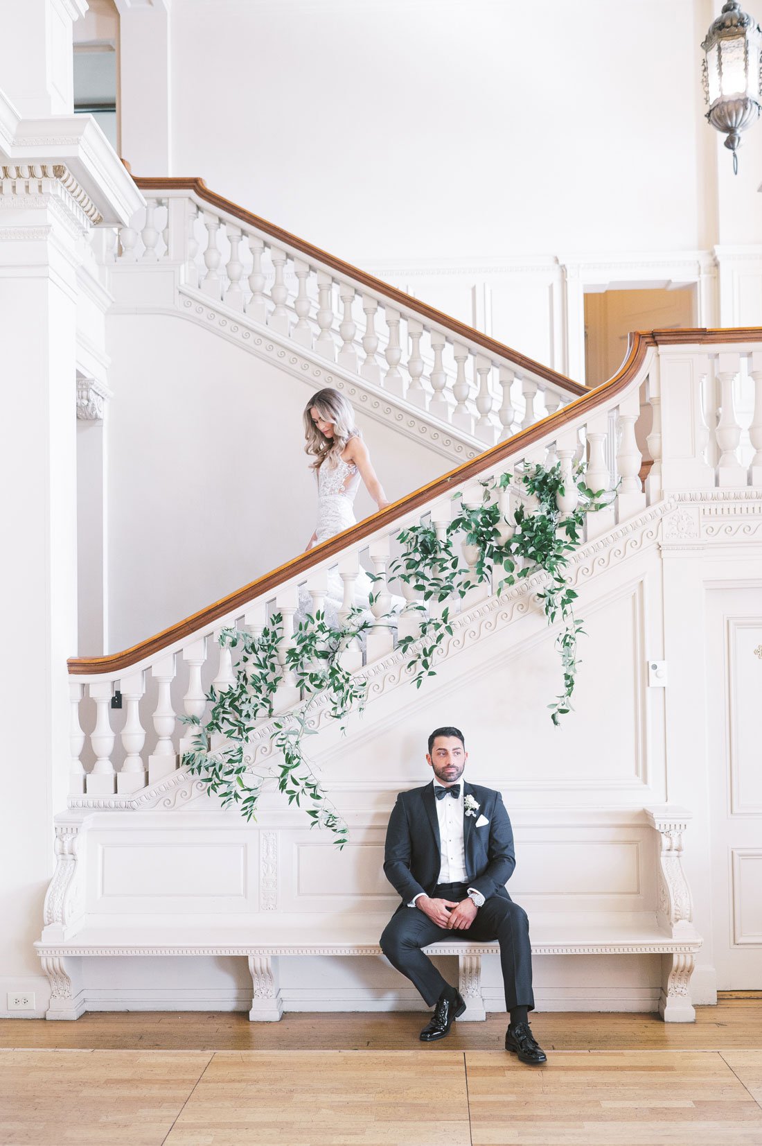 Bride Walking Down Staircase for First Look