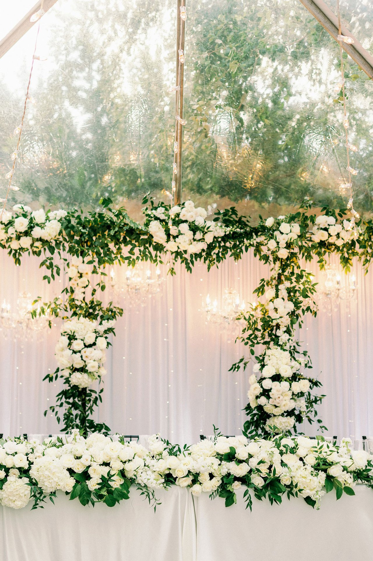 White Floral & Greenery Head Table Design