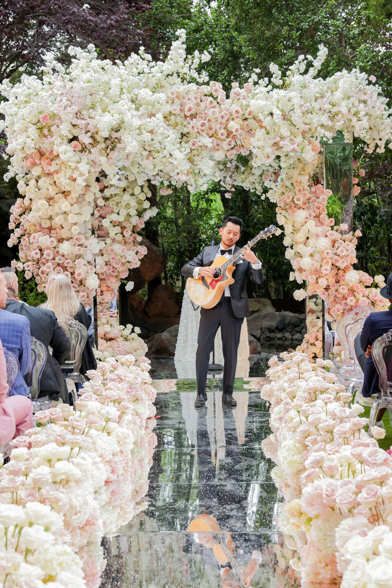 Live Guitarist Performing on Wedding Ceremony Aisle