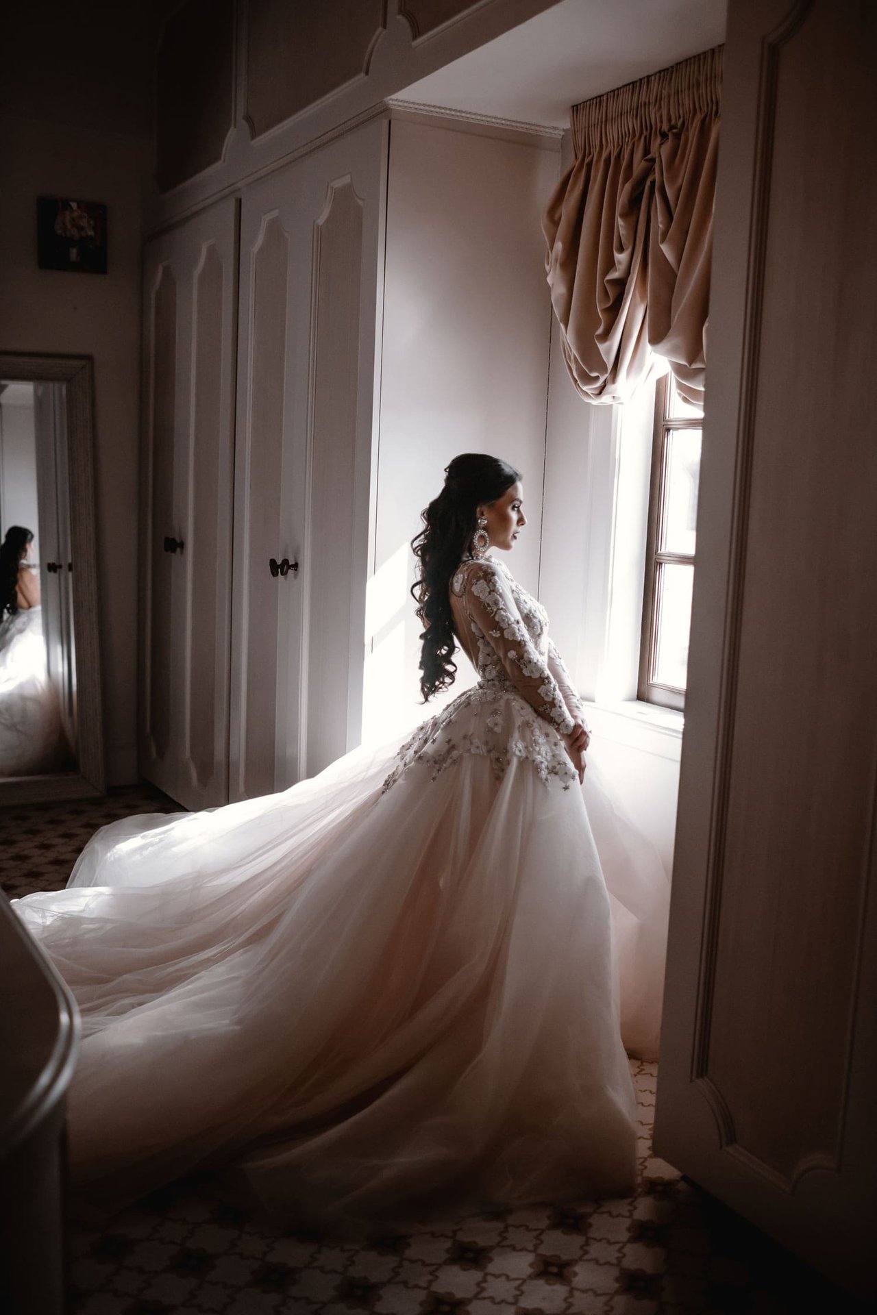 Bride in Custom Long-Sleeve Bridal Gown