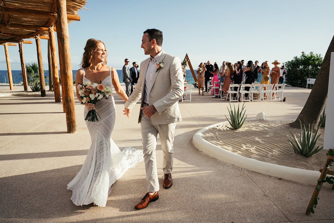 Happy Newlyweds Leaving Wedding Ceremony