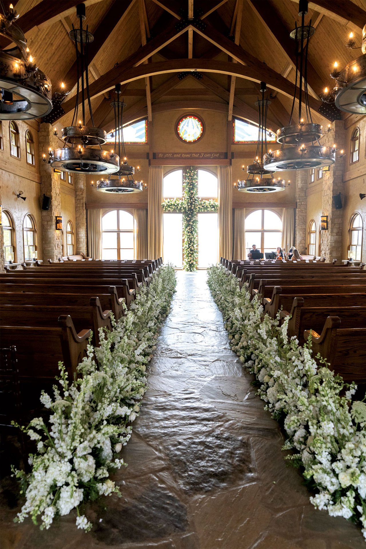 Floral-Embellished Cross at Chapel Ceremony