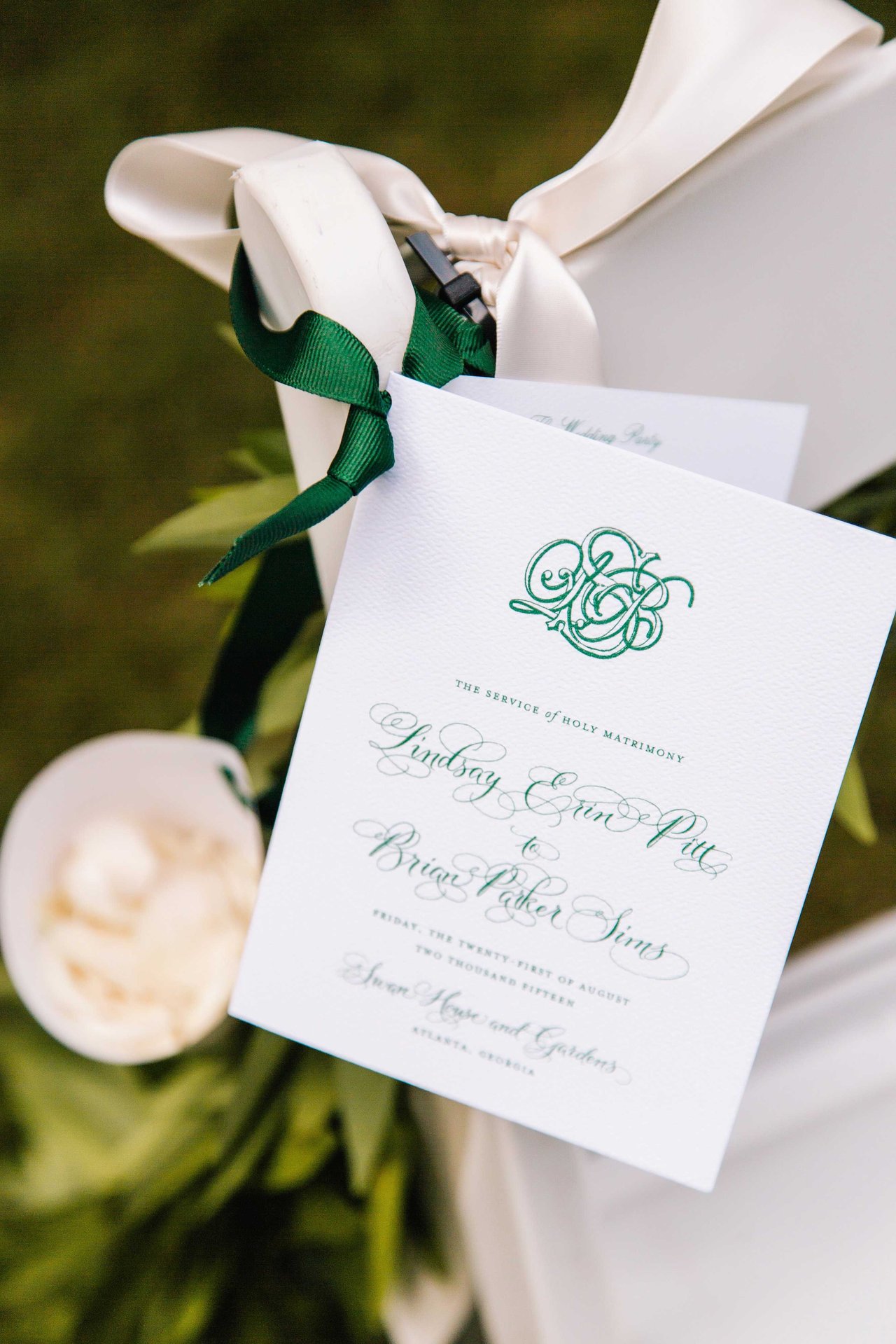 Ceremony Program Tied with Green Ribbon