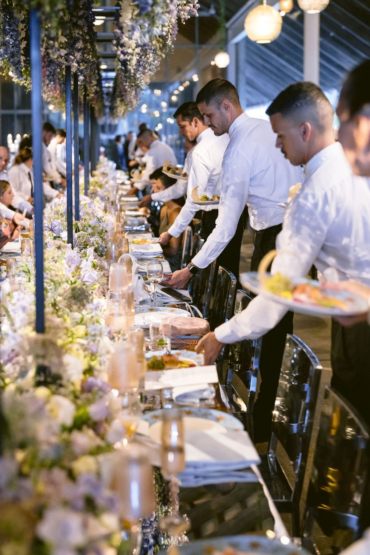Synchronized Servers at Wedding Reception