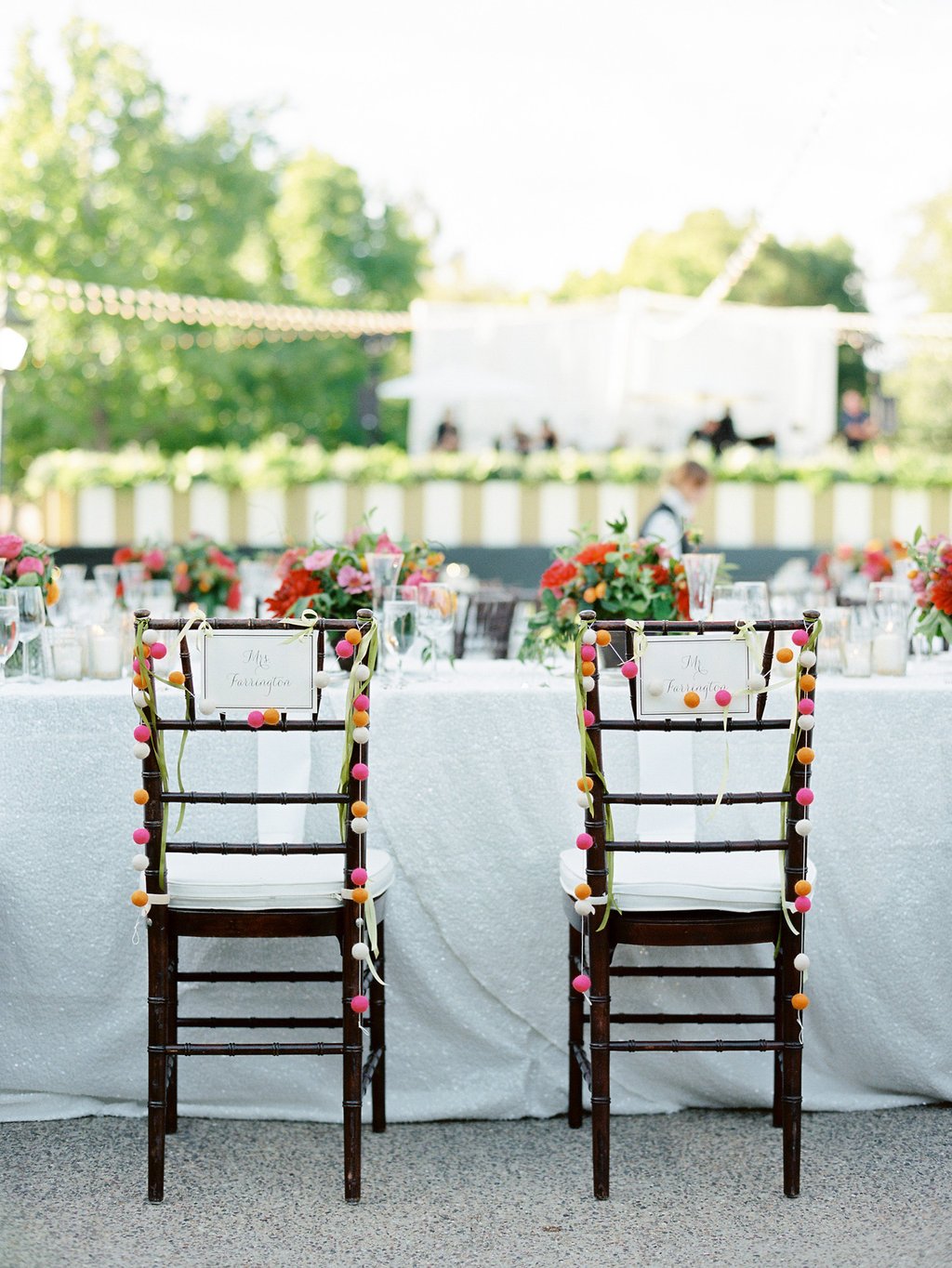 Bride & Groom Chairs with Vibrant Pom-Poms