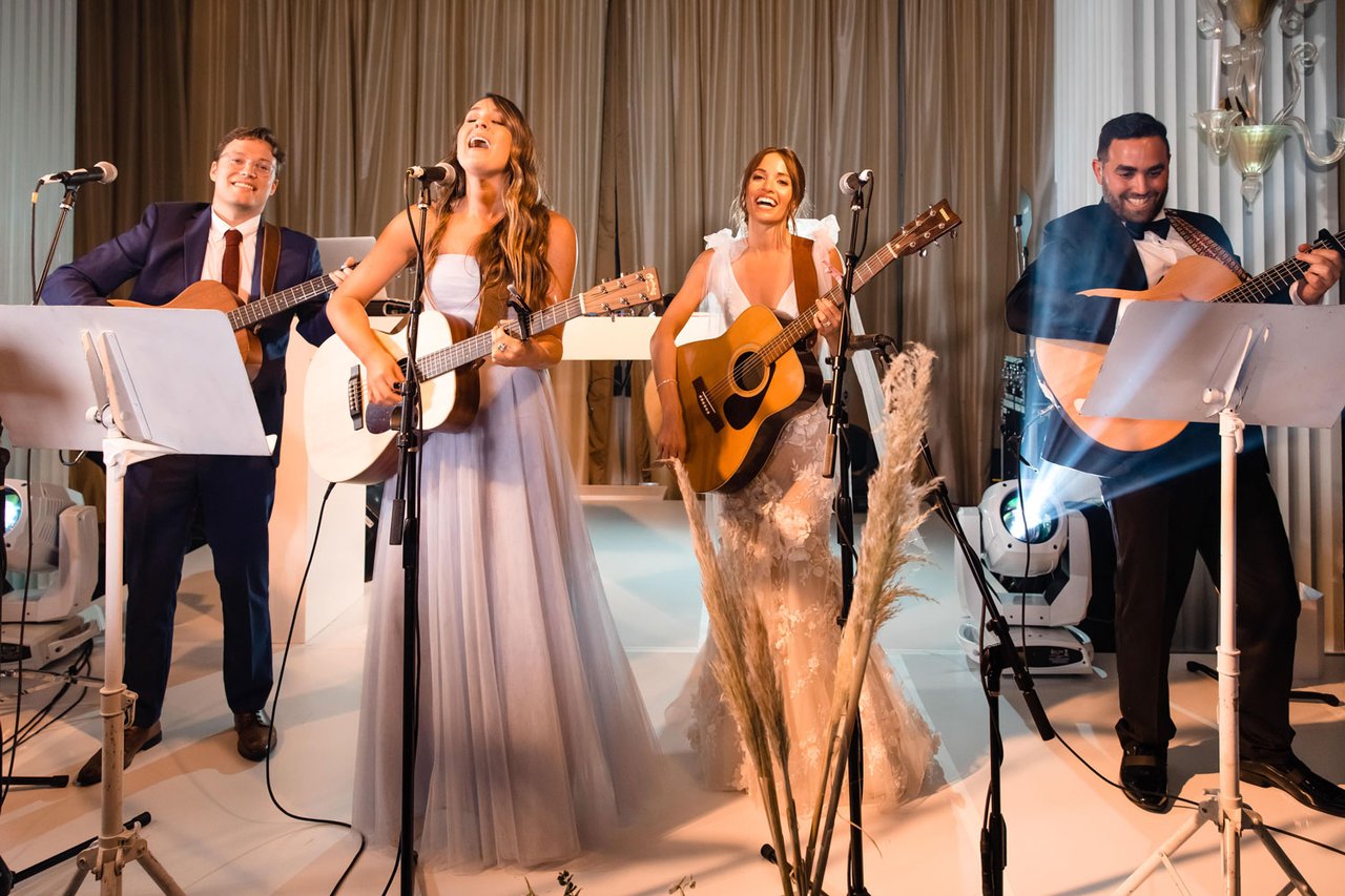Bride Performing with Friends at Reception