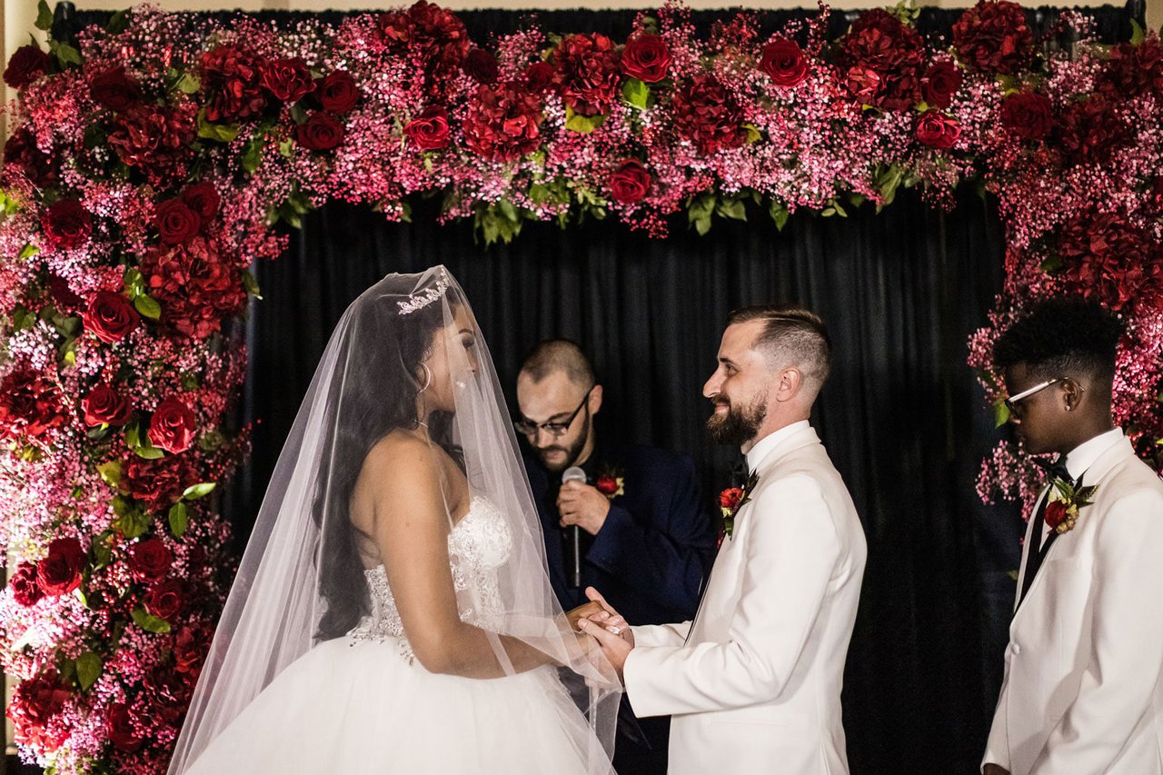 Bride & Groom Under Moody Luxe Arch