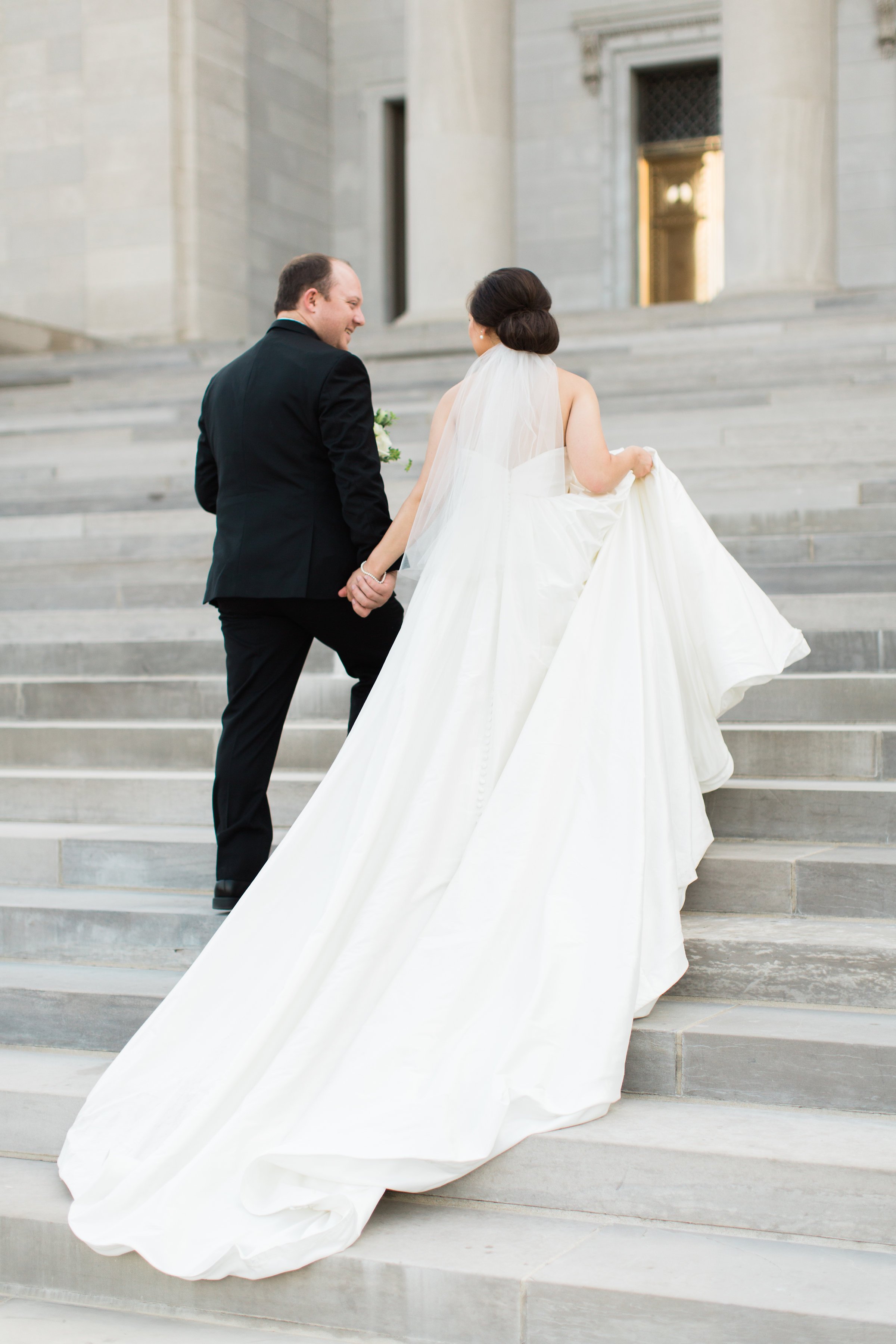 Bride and Groom Walk Up Steps