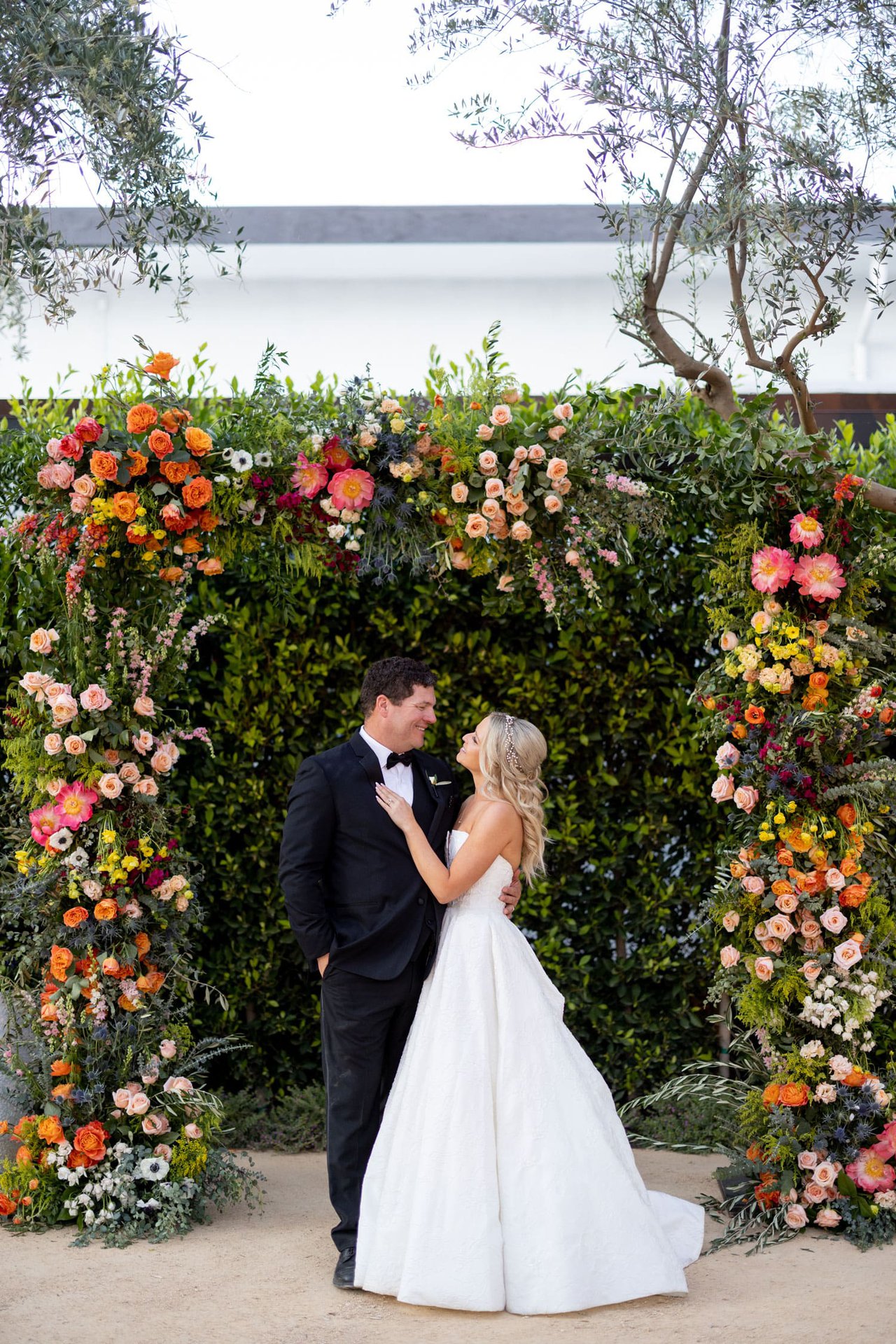 Bride & Groom Portrait Under Colorful Arch