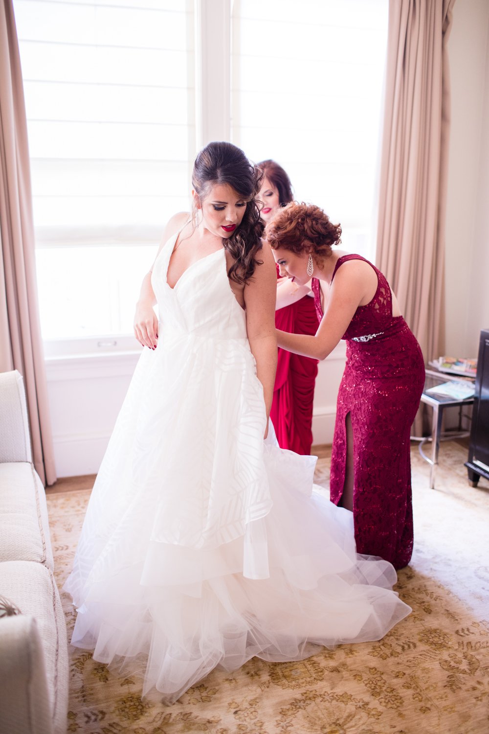 Bridesmaids Help Bride Into Gown bridesmaids-help-bride-into-gown