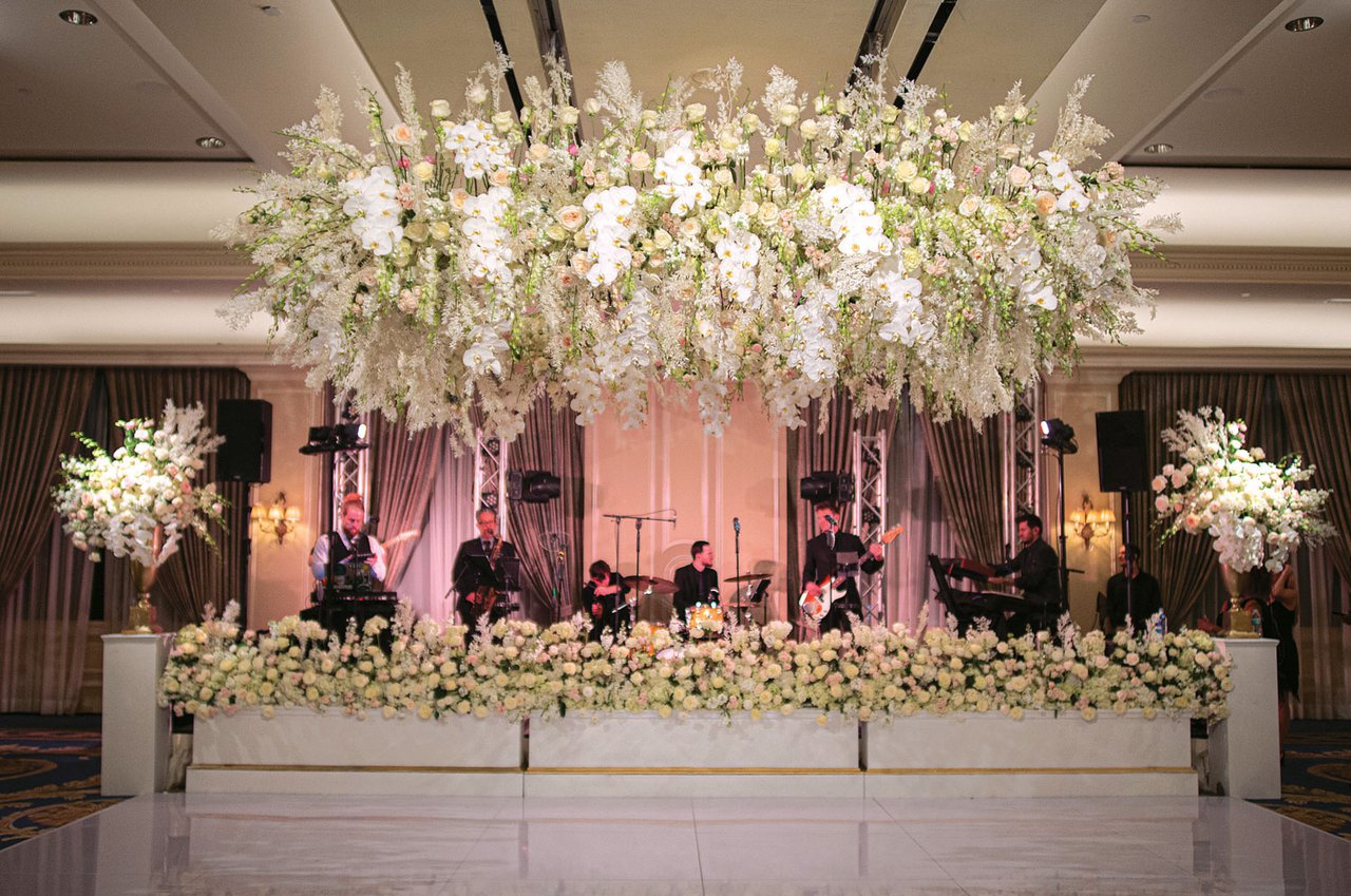 Band Stage with White Florals Overhead