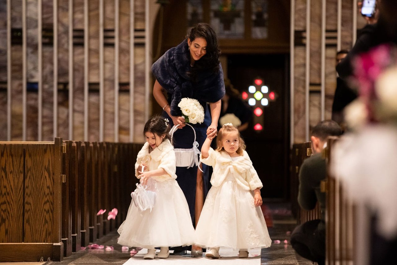 Bridesmaid Helping Two Flower Girls