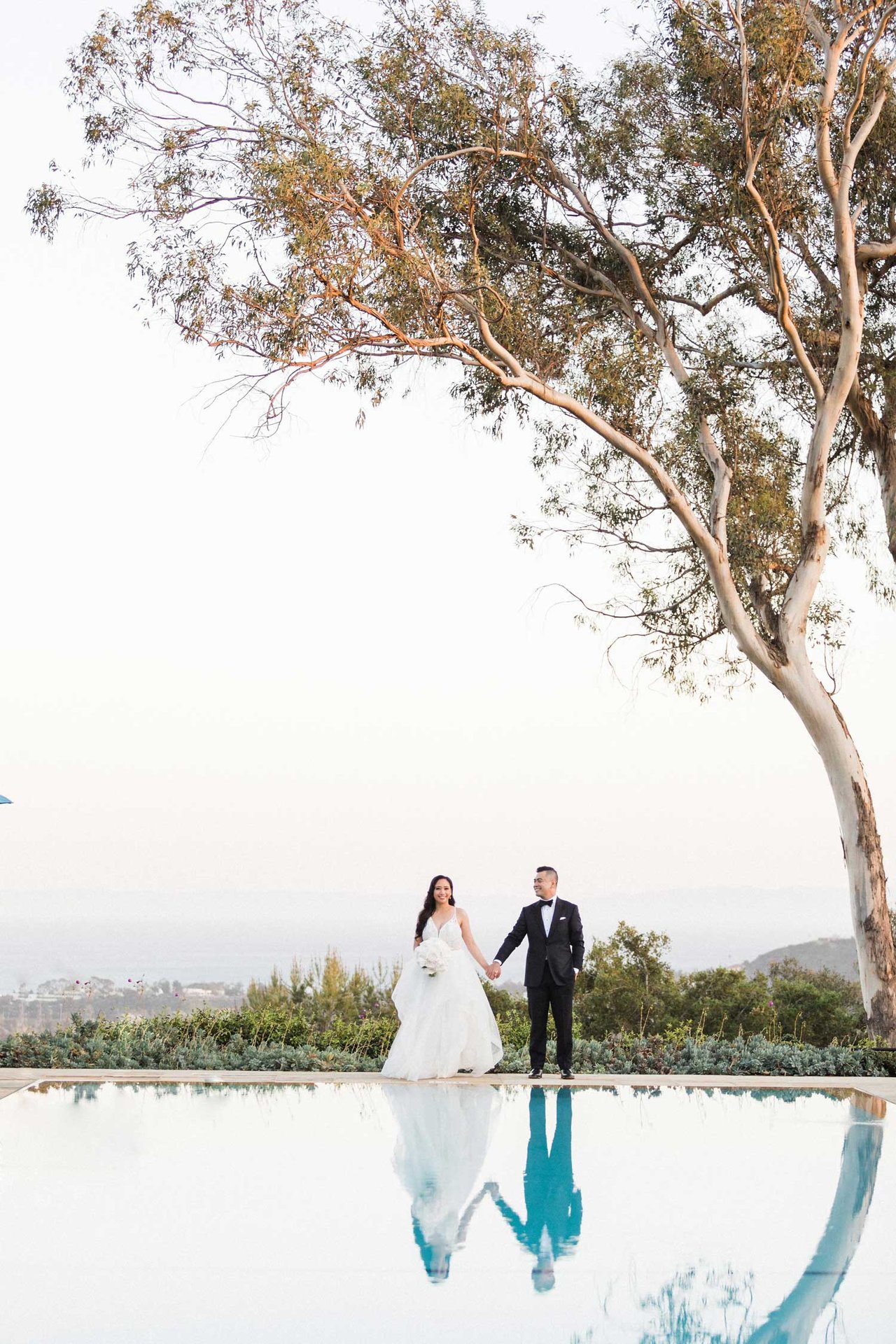 Bride & Groom's Reflection in Pool