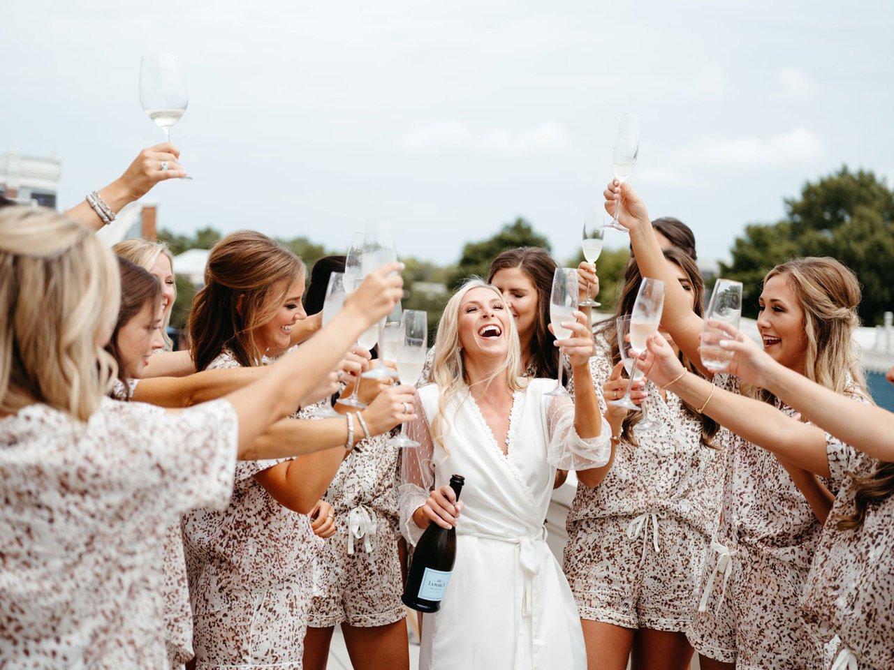 Bride & Bridesmaids Toasting Champagne