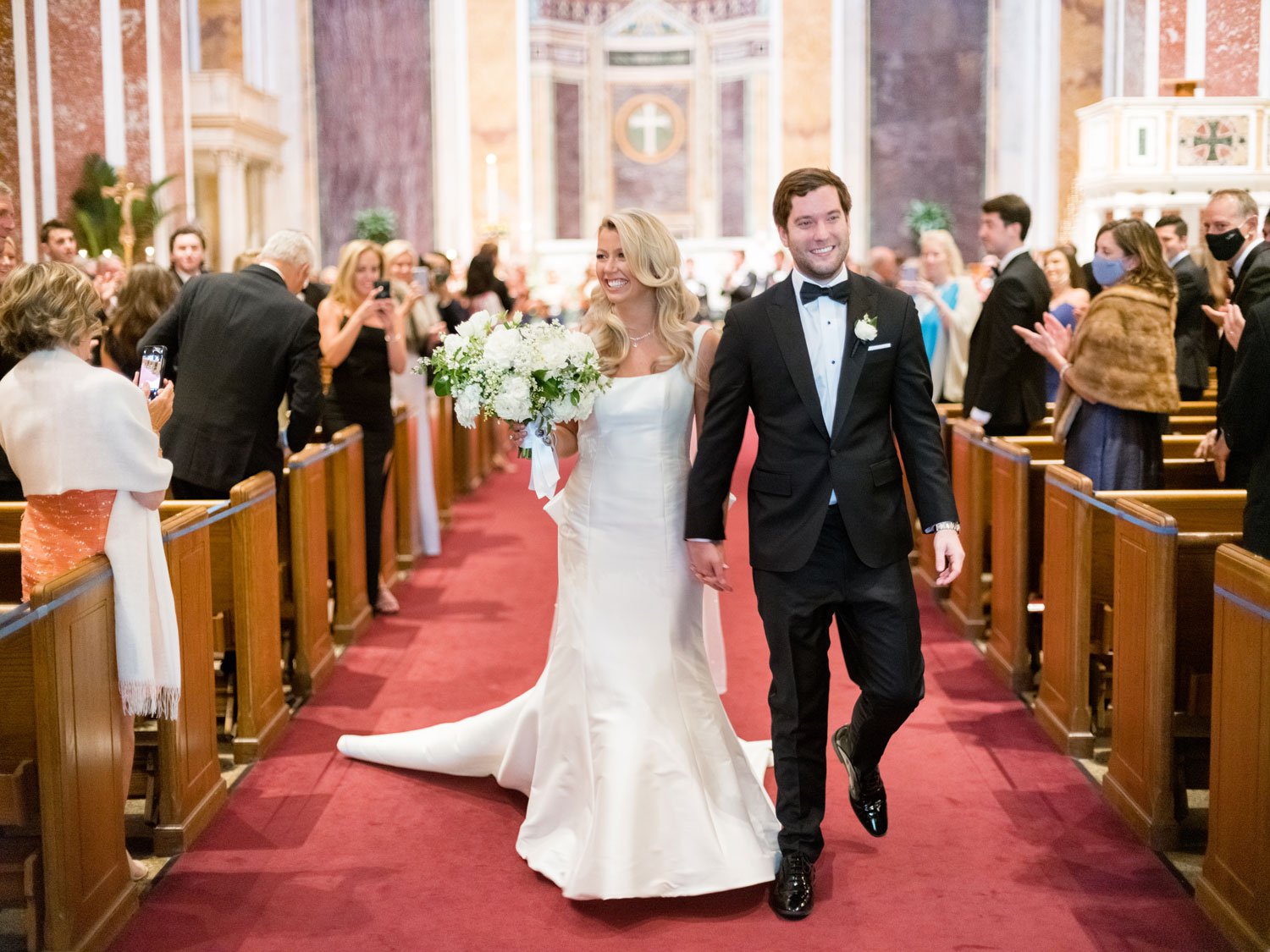 Newlyweds During Church Wedding Recessional
