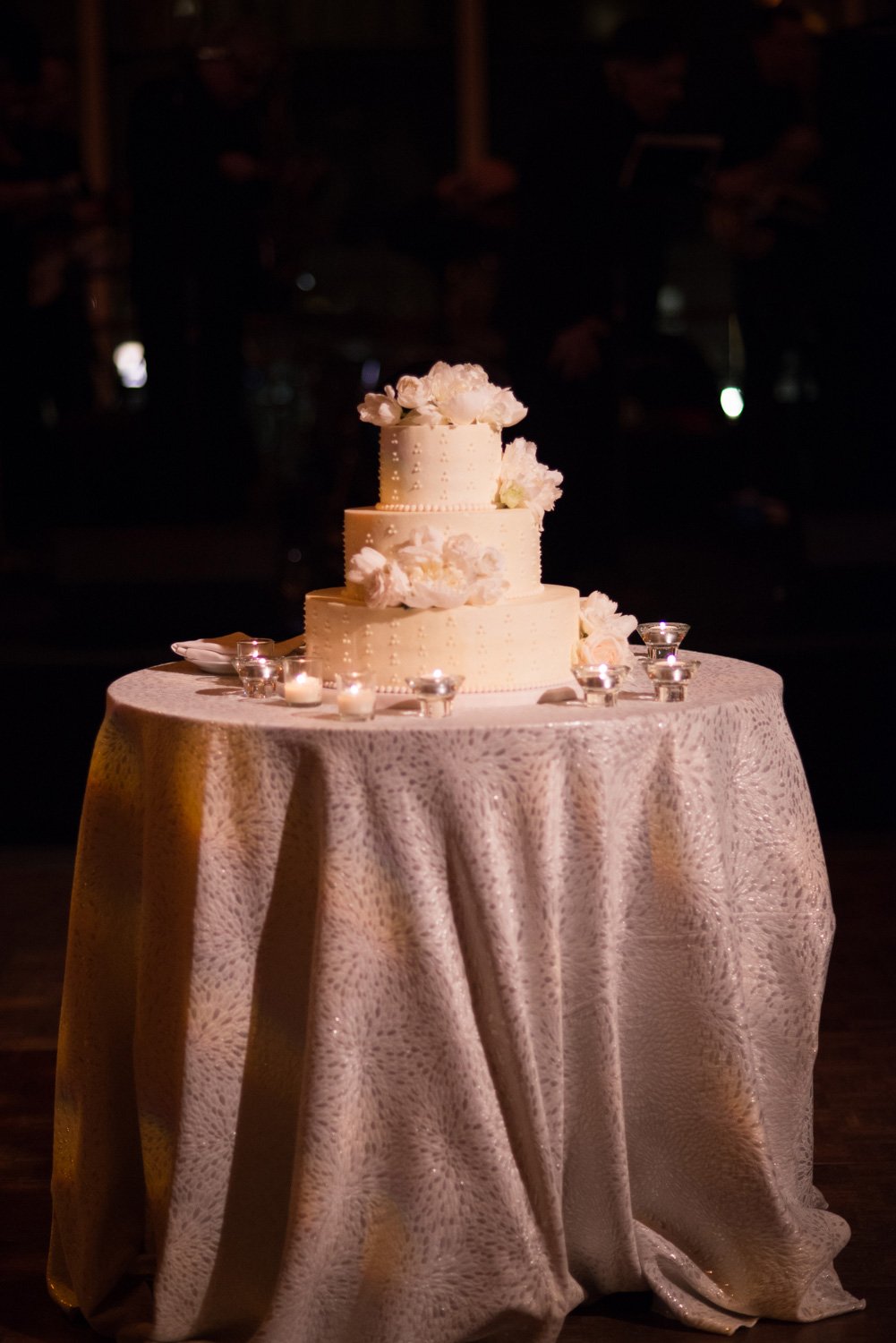 White Three Tier Cake with Flowers