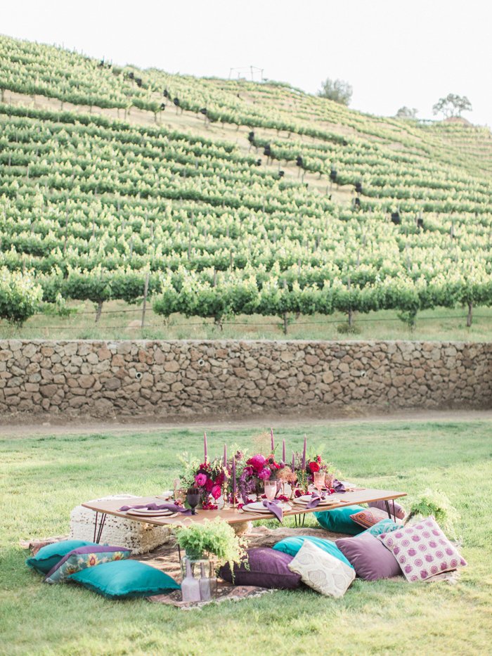Low Reception Table, Pillow Seats, Bold Color Scheme