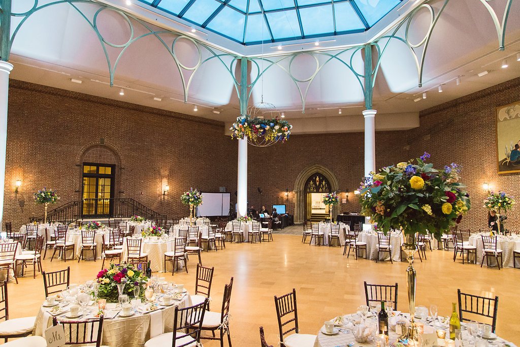 Open Reception Space, Round Tables, Floral Accents