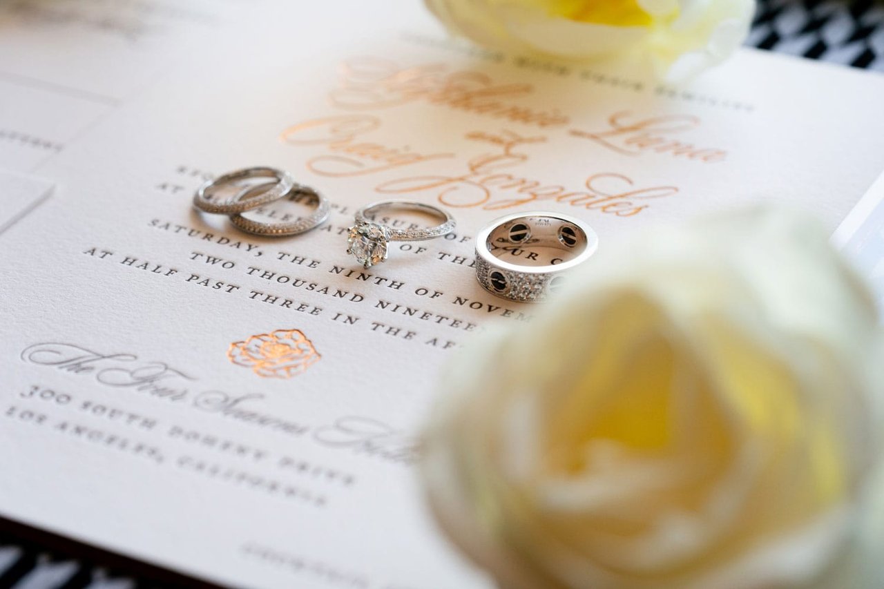Wedding Rings on Gold-Foil Invitation