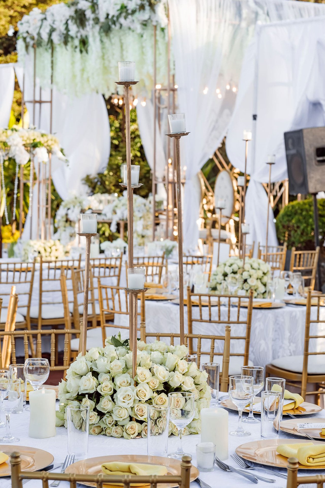 Tall Gold Candlesticks as Centerpiece
