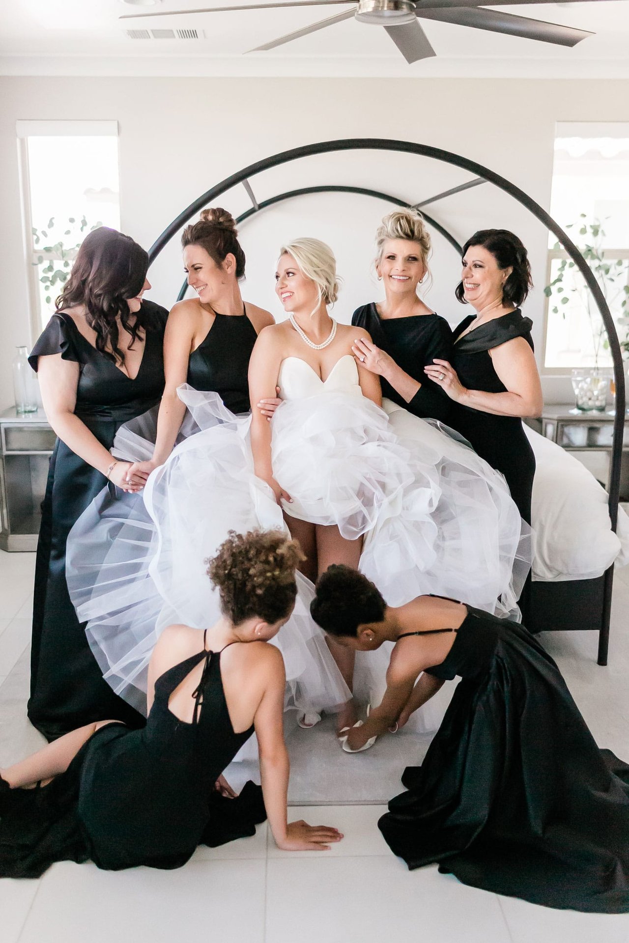 Bride Getting Ready with Family in Black Dresses