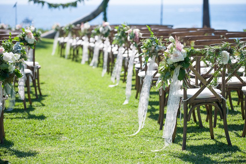 Romantic Floral Posies Along Aisle