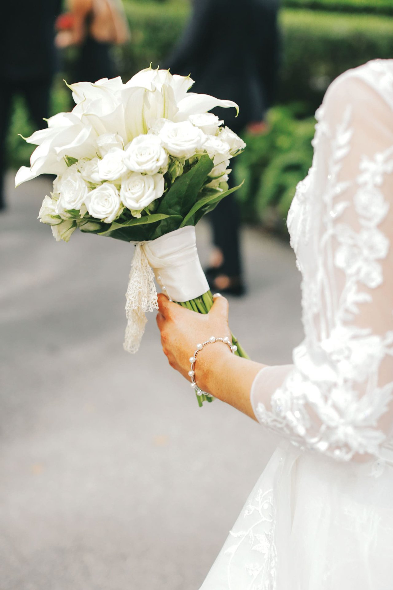 Bride Holding Rose & Calla Lily Bouquet