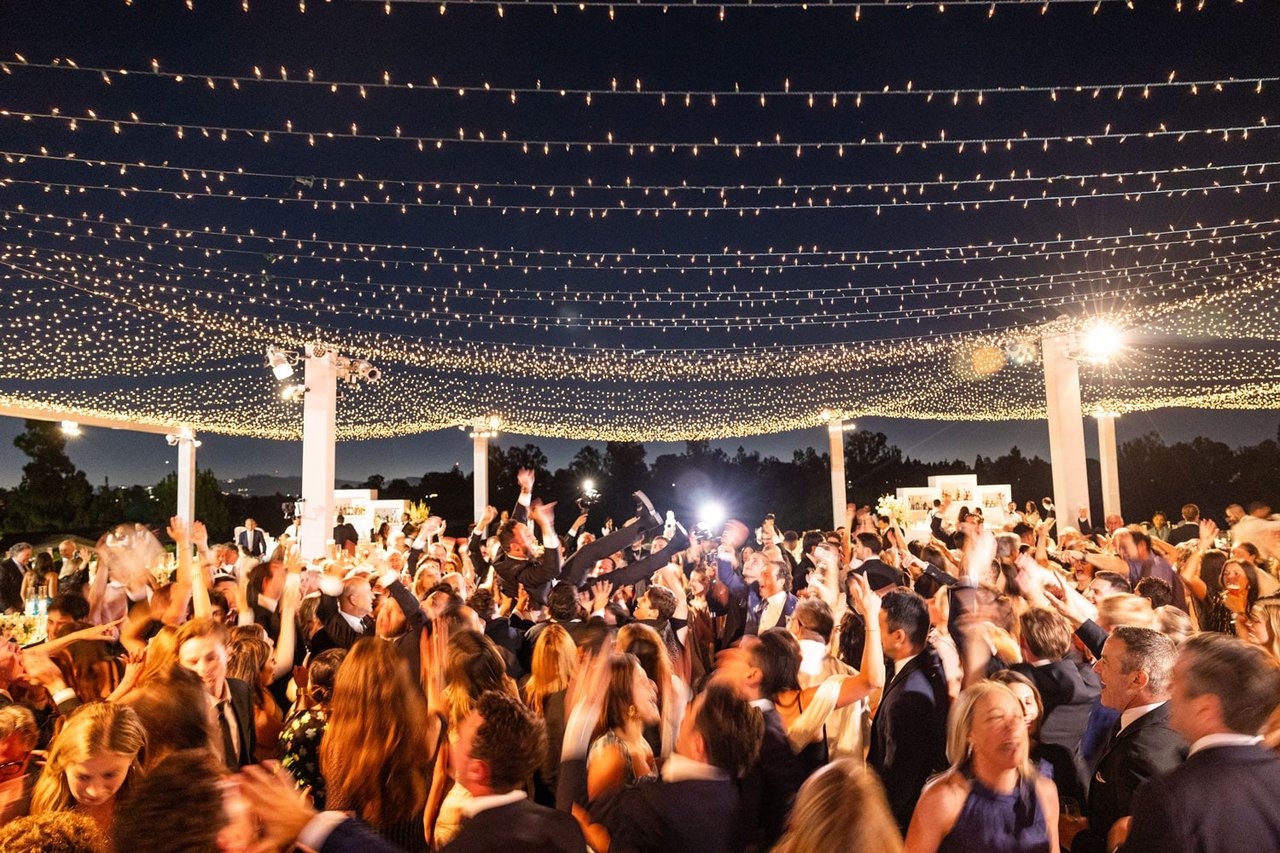 Groom Crowd-Surfing on Dance Floor