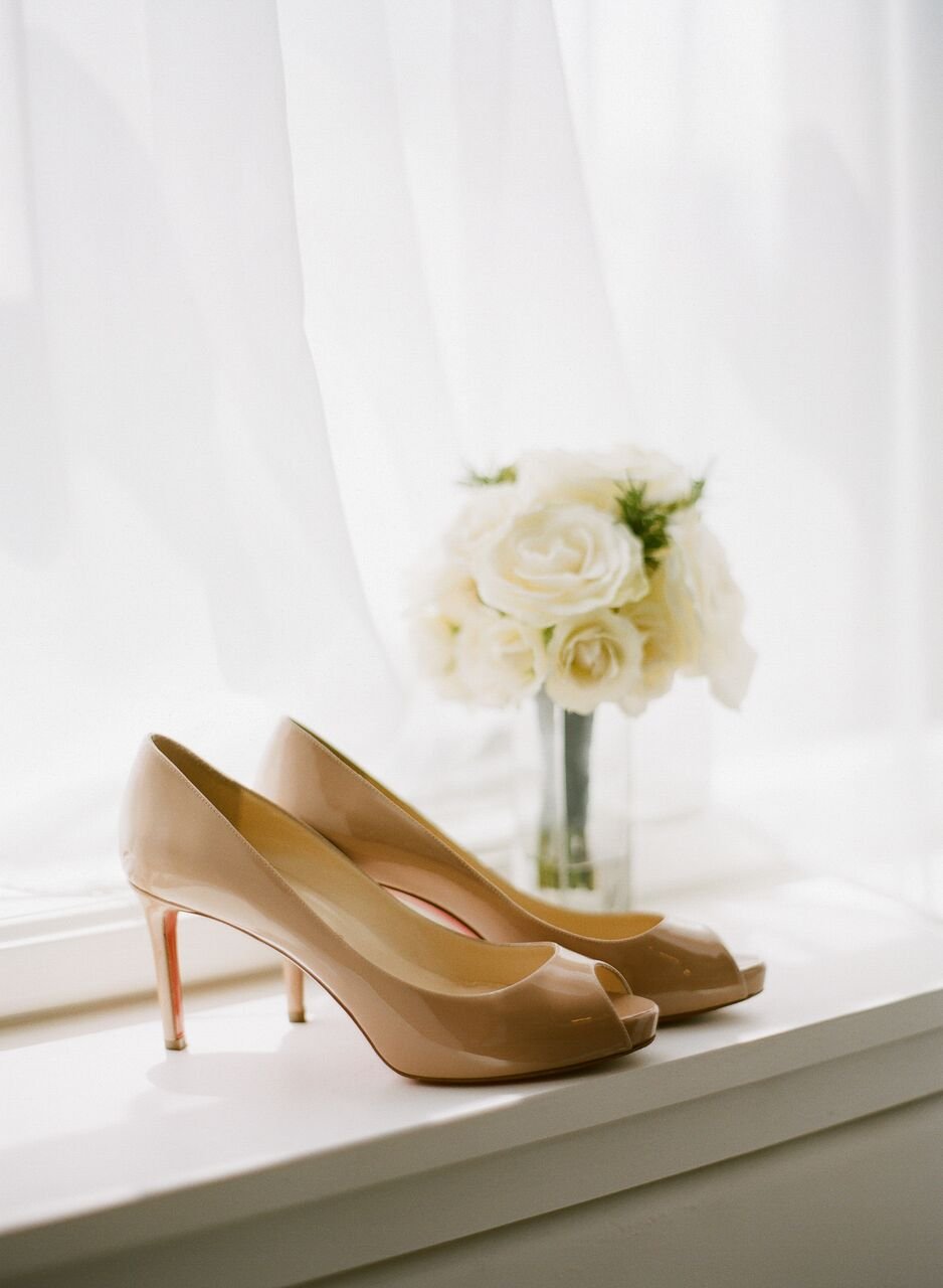 Beige Peep-Toe Pumps On Window Sill