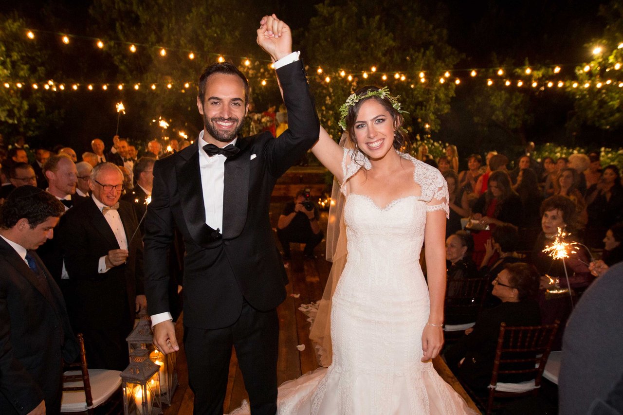 Newlyweds Make Grand Entrance Into Reception