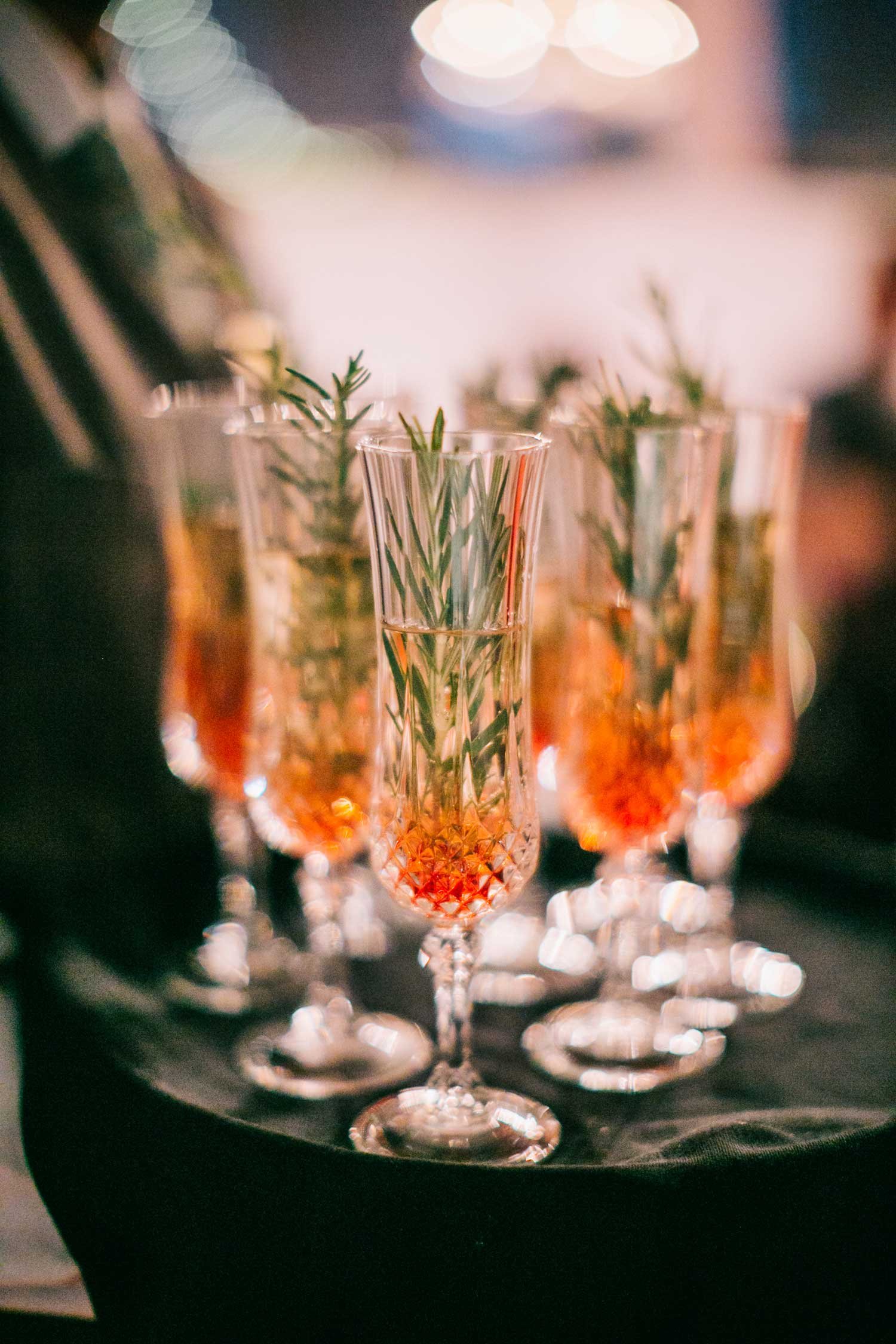 Champagne with Rosemary Garnish