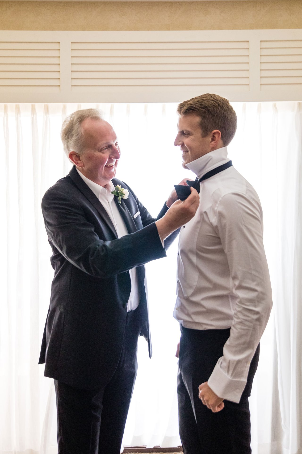 Father of the Groom Helping Groom