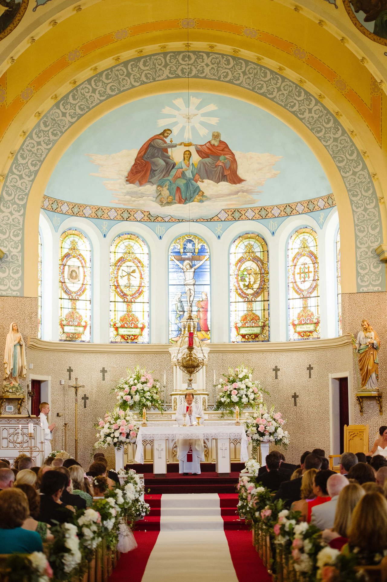 Ivory & Pink Blooms at Altar