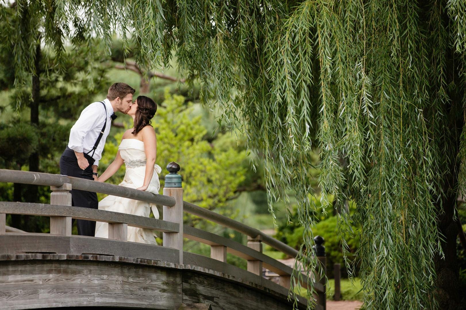 Couple Kiss on Bridge
