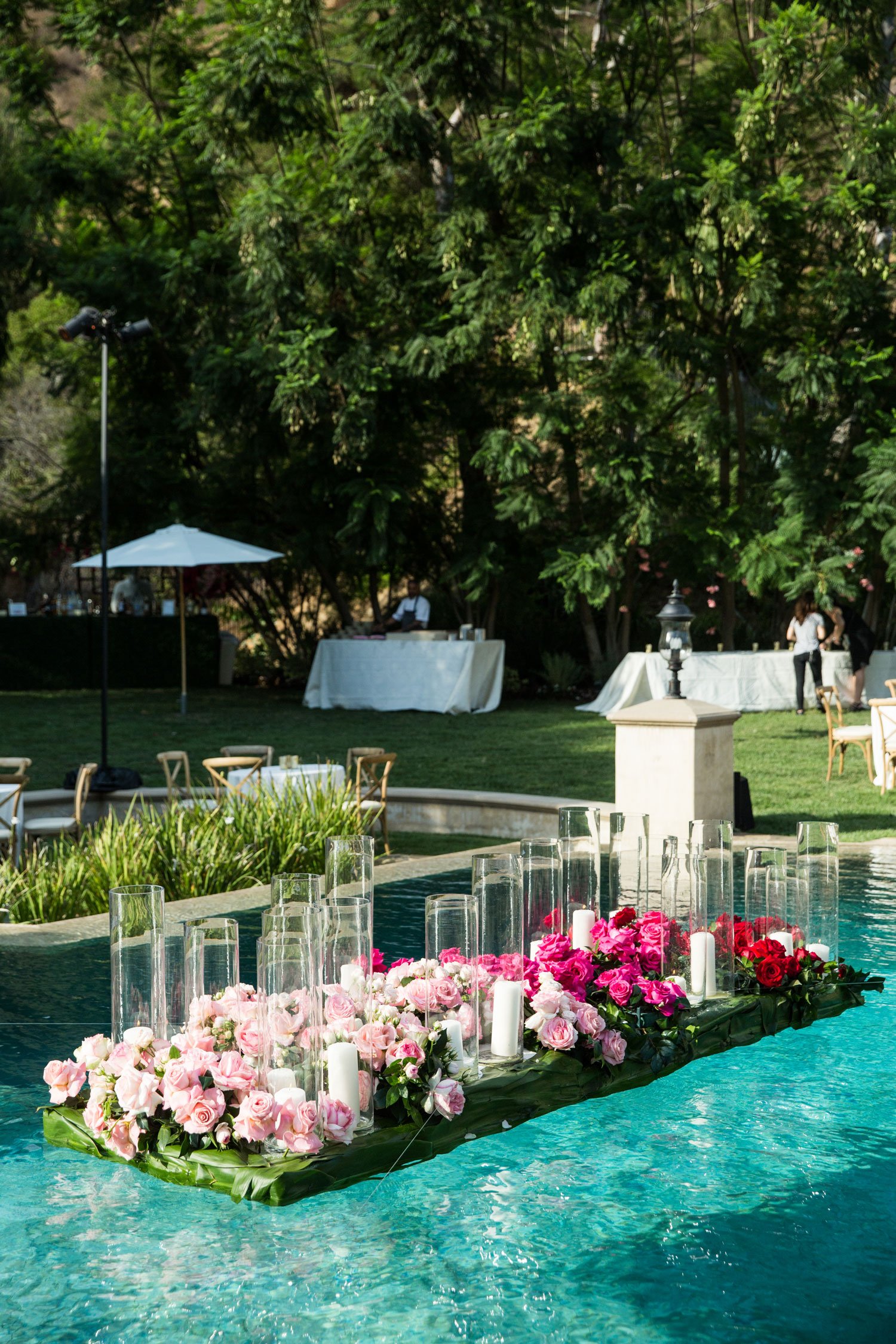 Flowers & Candles Floating on Pool